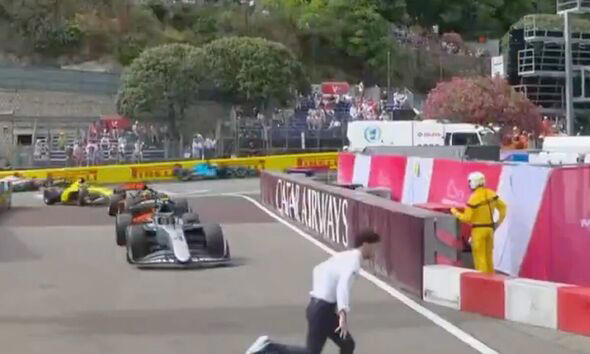 Scary Monaco Grand Prix incident as man very nearly struck by car mid-race