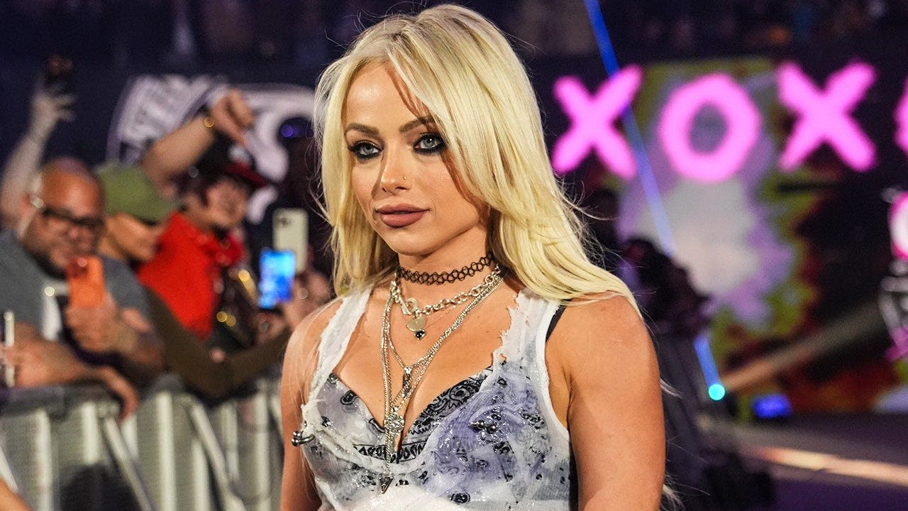 WWE's Liv Morgan flying off the top rope for bikini season, Emily ...