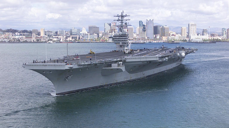 A US Nimitz-class carrier runs on two nuclear reactors and can sail ...