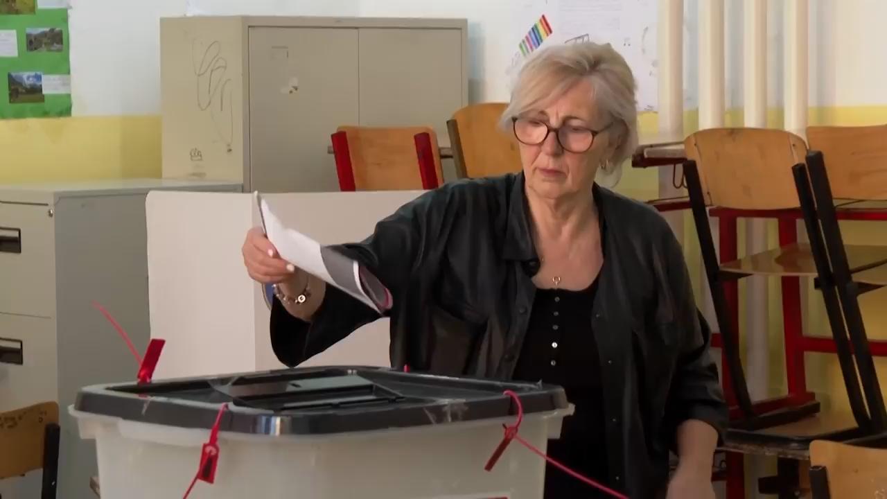 Prime minister and Serbian opposition leader vote in Kosovo elections