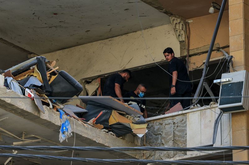 Israel strikes Beirut despite truce, Iran threatens to retaliate