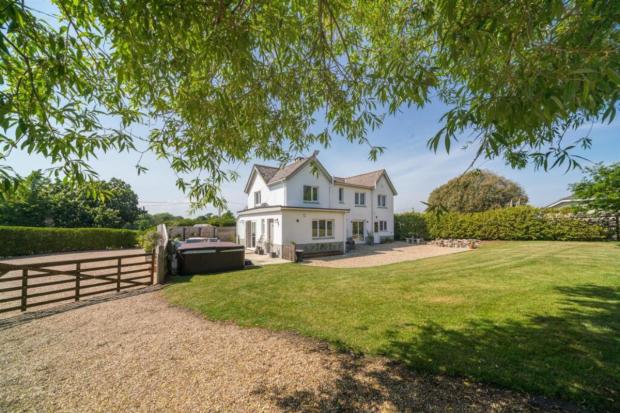 Family home with games room, gym and treehouse for sale in Bembridge