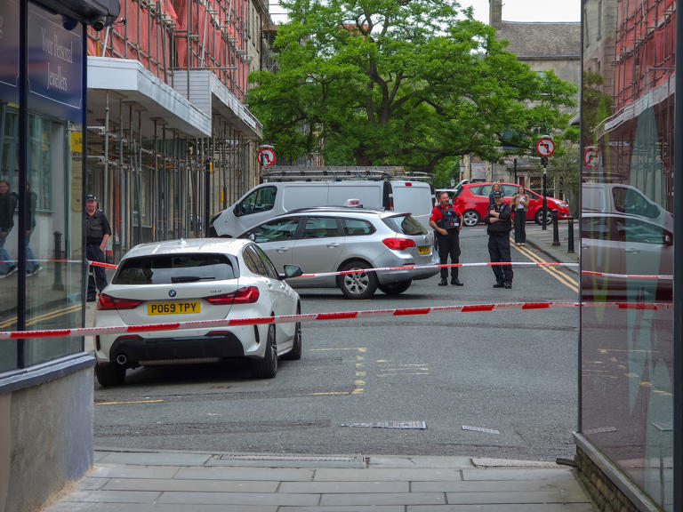Police evacuate pub and shut road as 'derelict' building in Lancaster ...