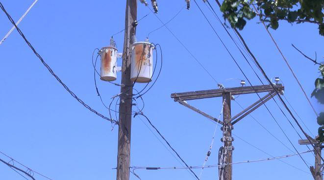 HMP&L removing and replacing power poles and transmission lines