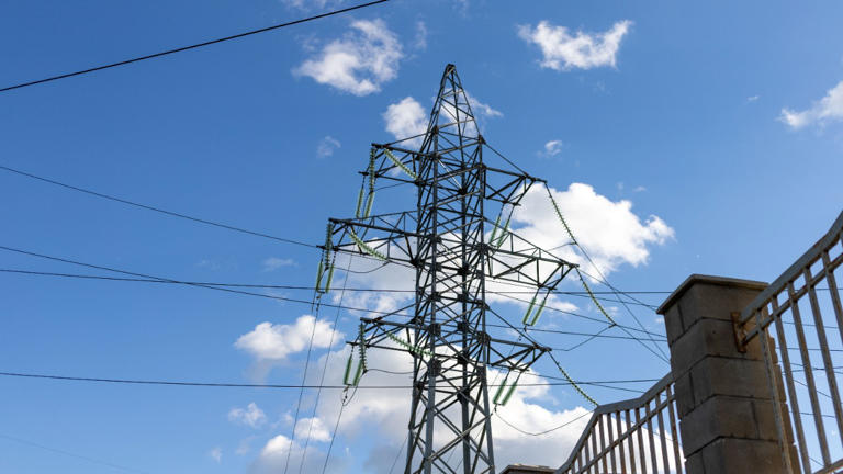 High-voltage power lines move electricity long distances by raising ...