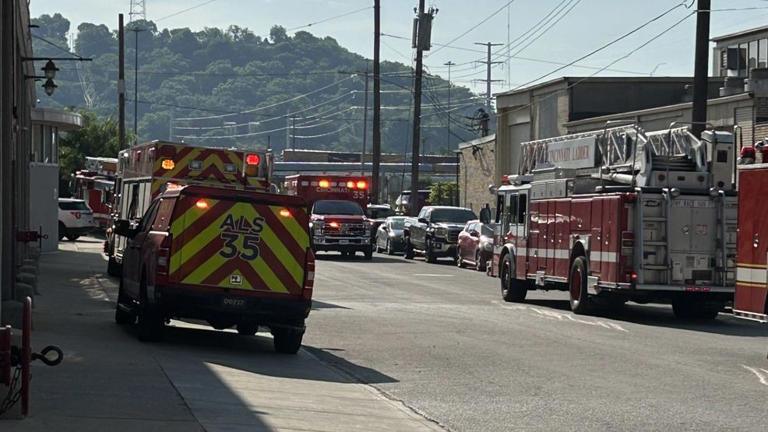 Car flips over, lands overturned in creek after crash in Cincinnati