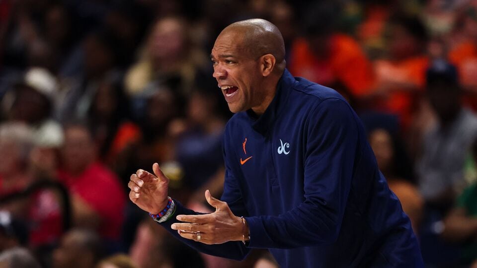 WNBA coach Sydney Johnson escorted off court by police after heated ...
