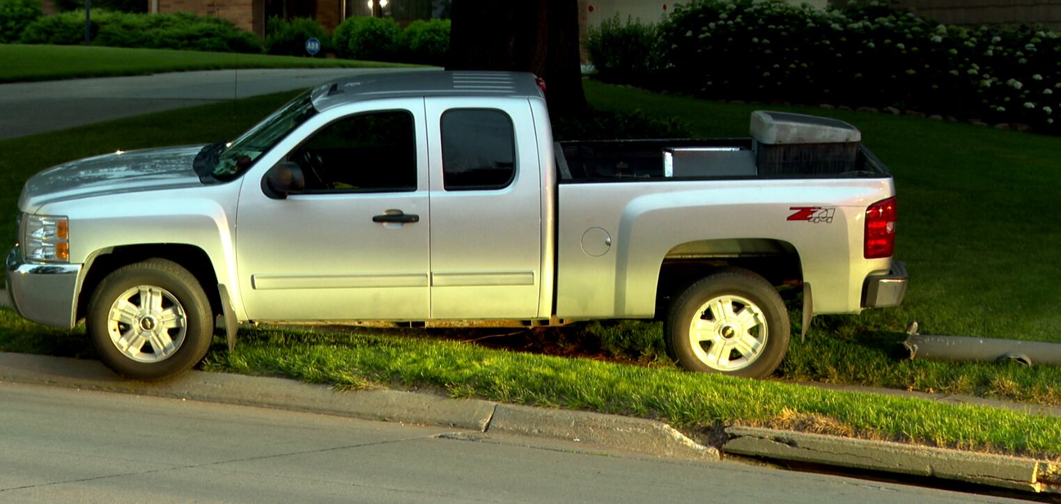 One hospitalized after crash knocks down light pole in central Omaha