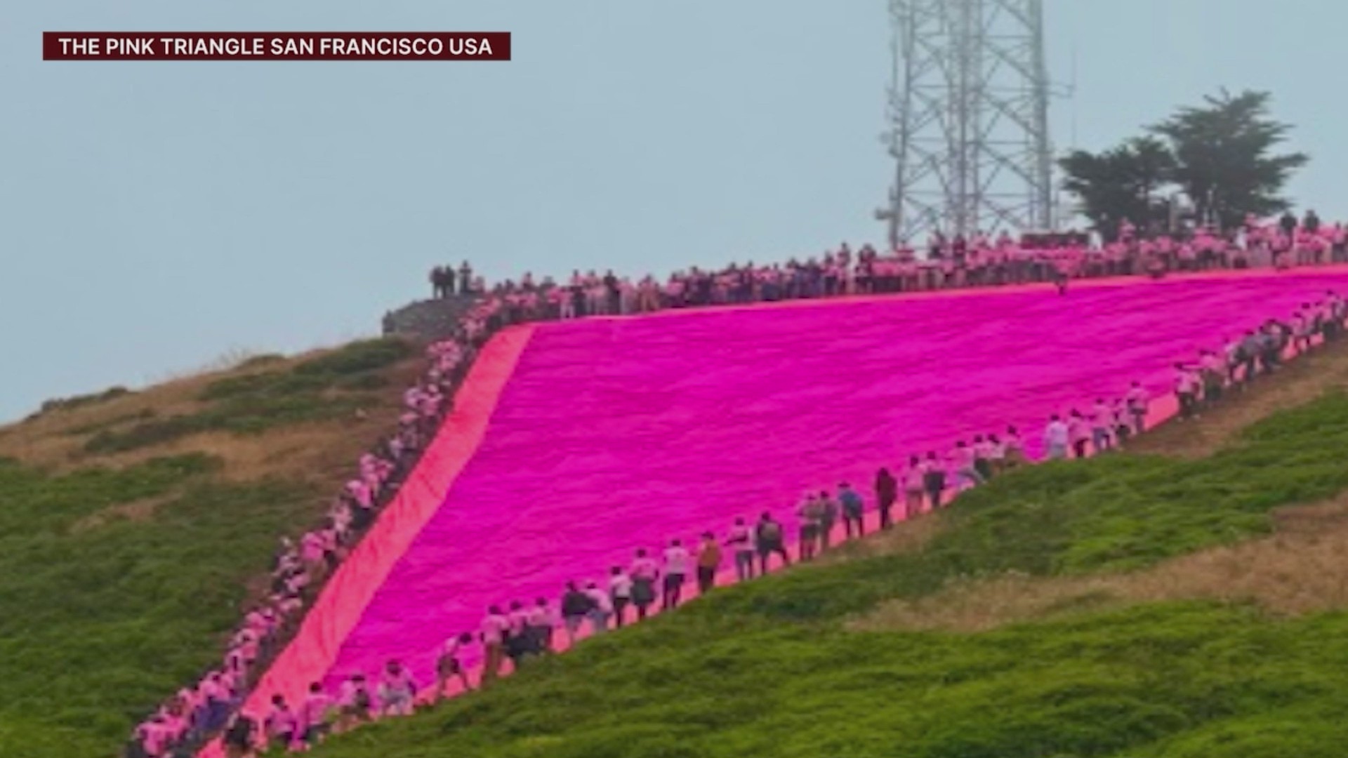 100s gather for 31st annual pink triangle installation