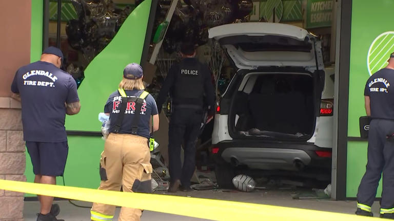 2 employees hospitalized after car slams into Dollar Tree in Peoria