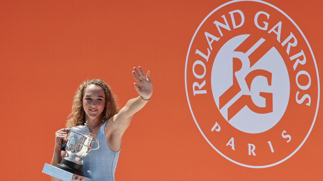 French Open winner Mirra Andreeva quickly corrects trophy pose after ...