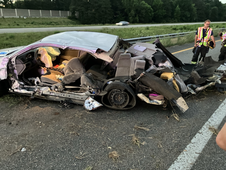 Person seriously injured after car runs off road, hits guardrail on I-95