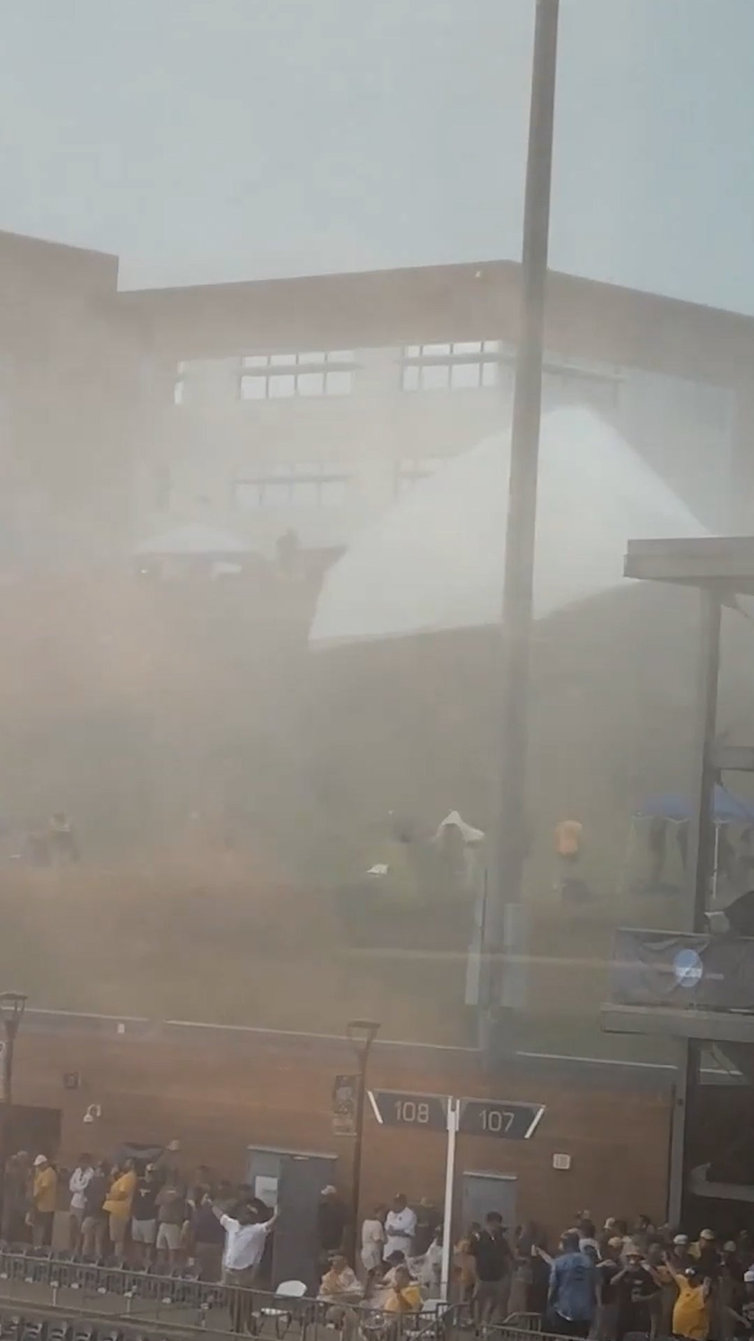 Winds injure 5 at NCAA game