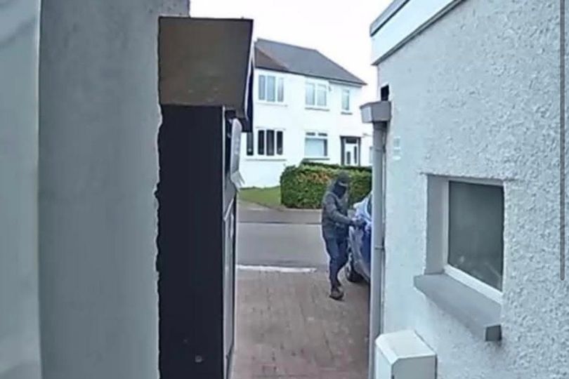 Moment hooded Edinburgh man caught on CCTV lurking outside homes before ...