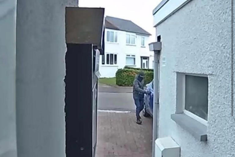 Moment hooded Edinburgh man caught on CCTV lurking outside homes before ...