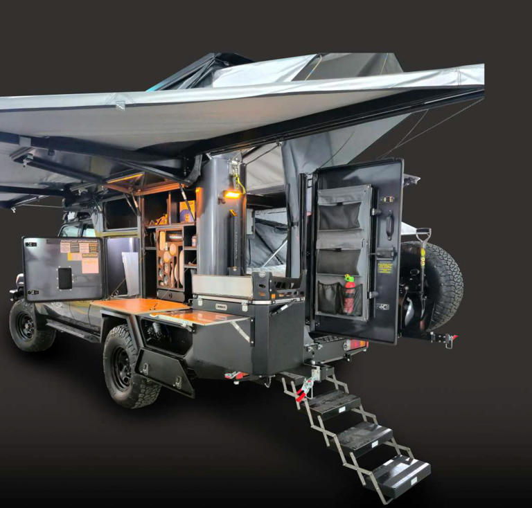 This Land Cruiser camper sleeps four and hides a shower cubicle
