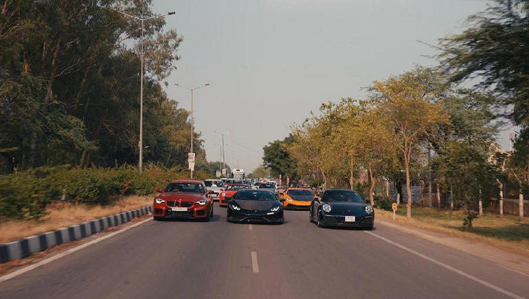 Moving in fast lane: Supercar junkies move with families for the love ...