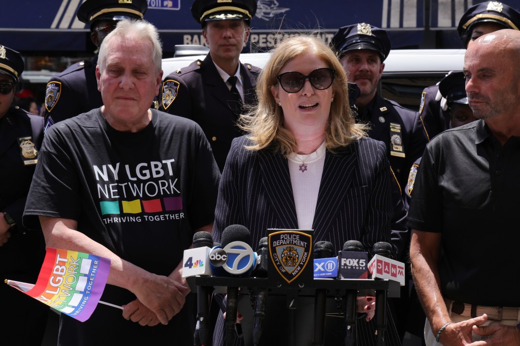NYPD commish walks with armed gay cops in Queens Pride parade, rips ...