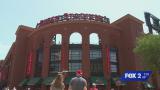 Fans brave heat for busy St. Louis sports Sunday