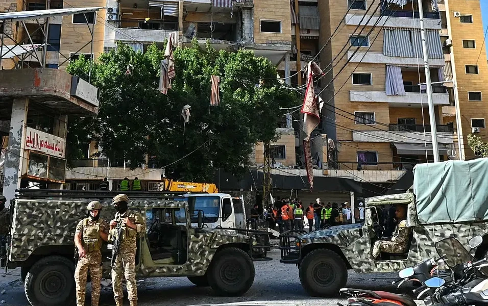Israeli strikes hit Beirut suburb after Hezbollah rocket fire