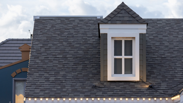 12 paint colors that pair beautifully with a black roof (and one we'd ...