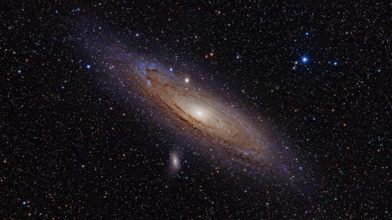 The Milky Way and Andromeda galaxies are slowly drifting toward a ...