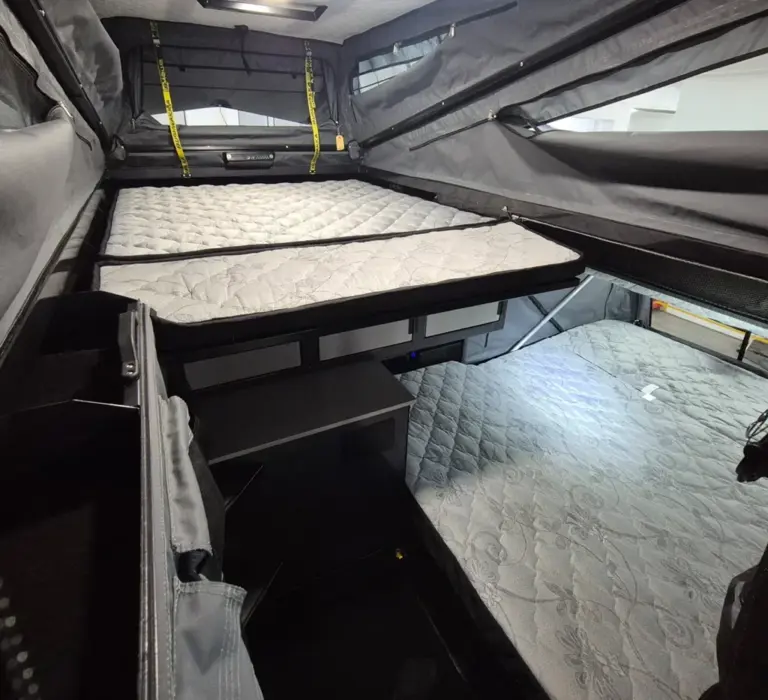 This Land Cruiser camper sleeps four and hides a shower cubicle