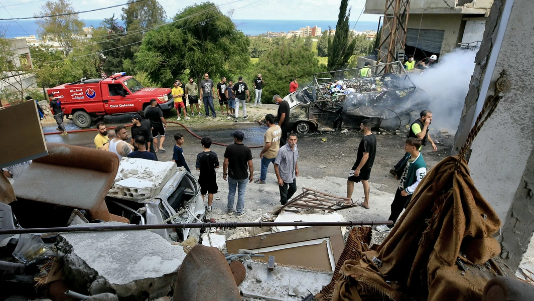 Israeli strikes hit Beirut suburb after Hezbollah rocket fire