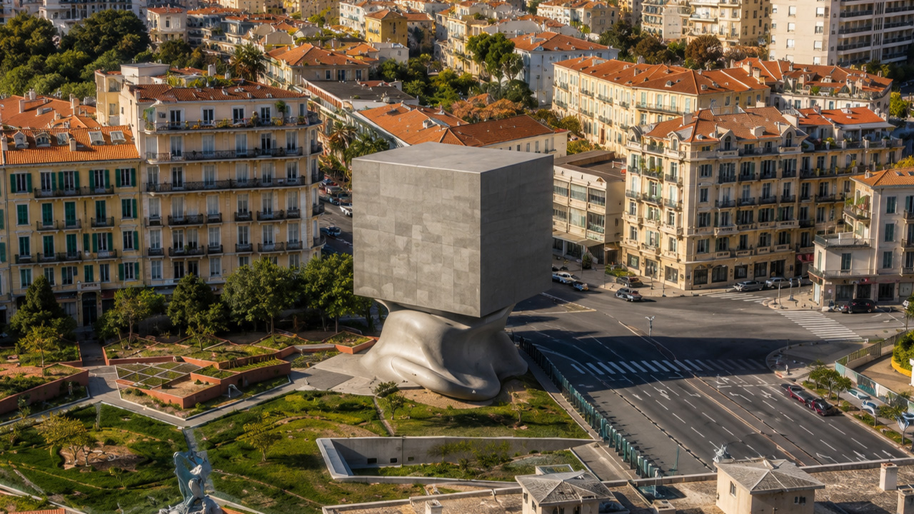 What is that giant cube rising over Nice?