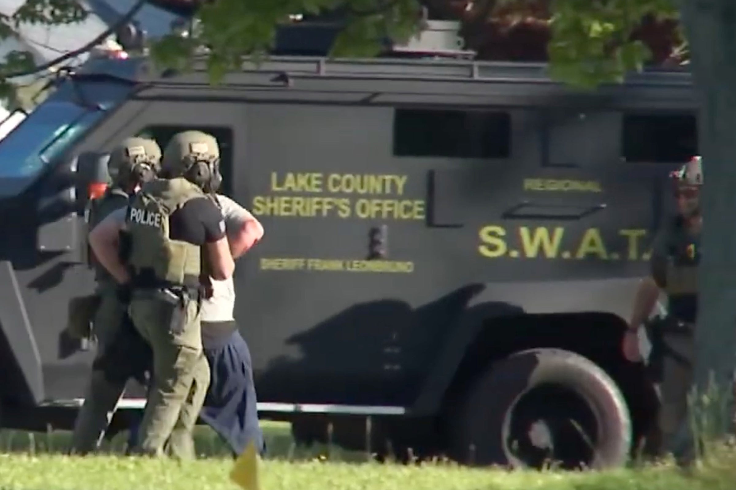 Armed standoff after suspect runs down one cyclist, assaults another ...