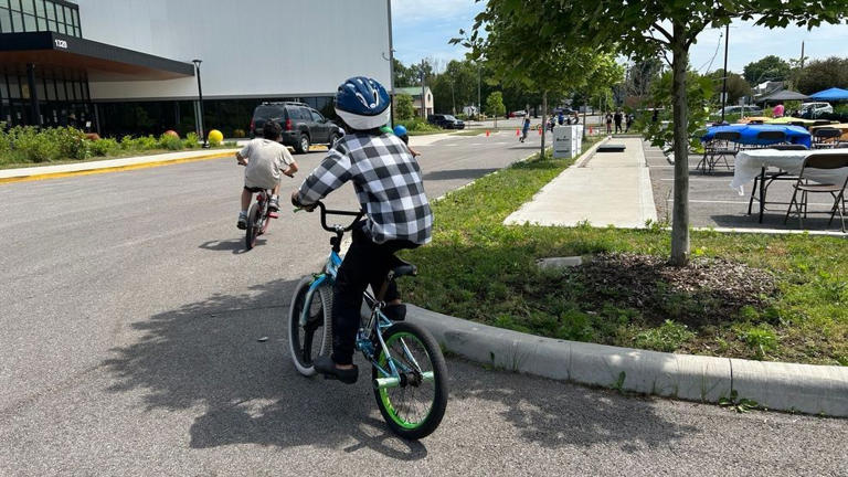 Kids learn bike safety skills at the Tolson Center Bike Safety Rodeo