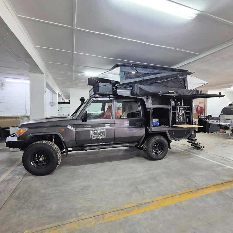 This Land Cruiser camper sleeps four and hides a shower cubicle