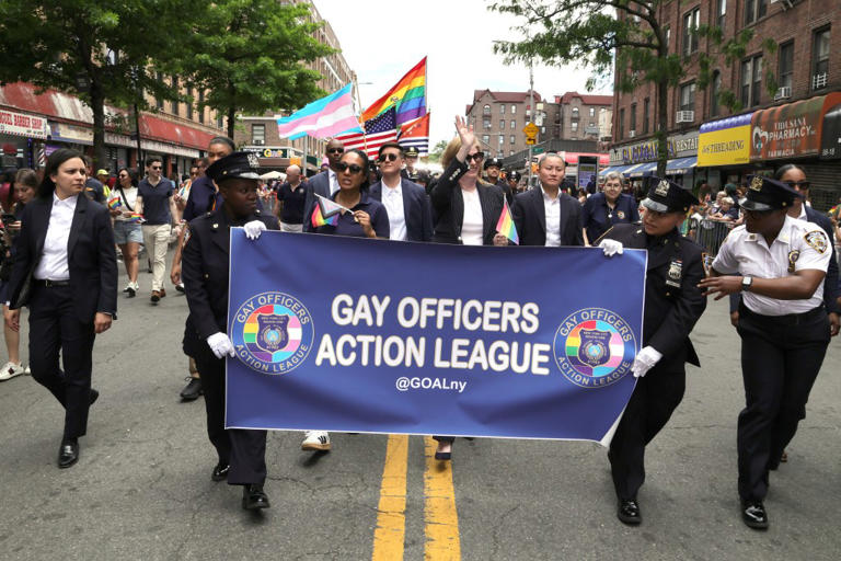 NYPD commish walks with armed gay cops in Queens Pride parade, rips ...