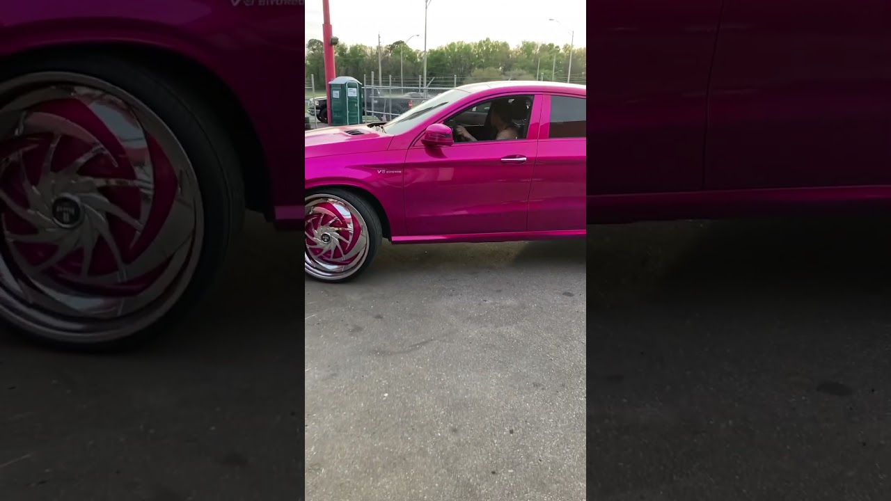 Pink GLE63 Mercedes on 28’s floaters