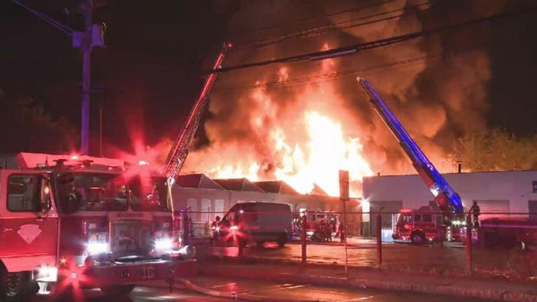 Crews battling five-alarm fire at Rochester pallet factory