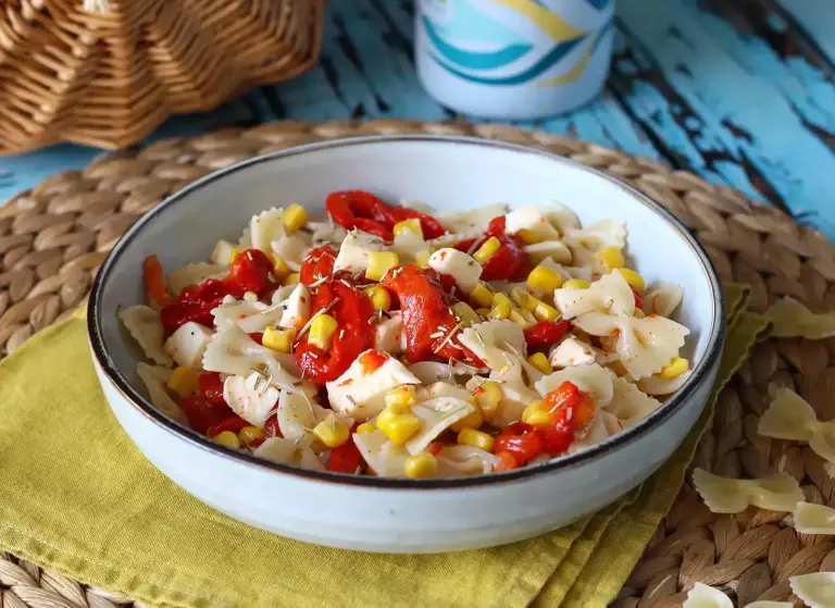 Cold pasta with peppers, corn and mozzarella cheese