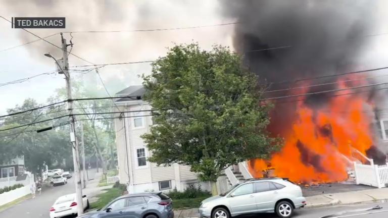 Electric vehicle explodes in Winthrop driveway, causing fire that ...