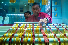 Gold prices drop further in Dubai, losing more than Dh48 per gram in a ...