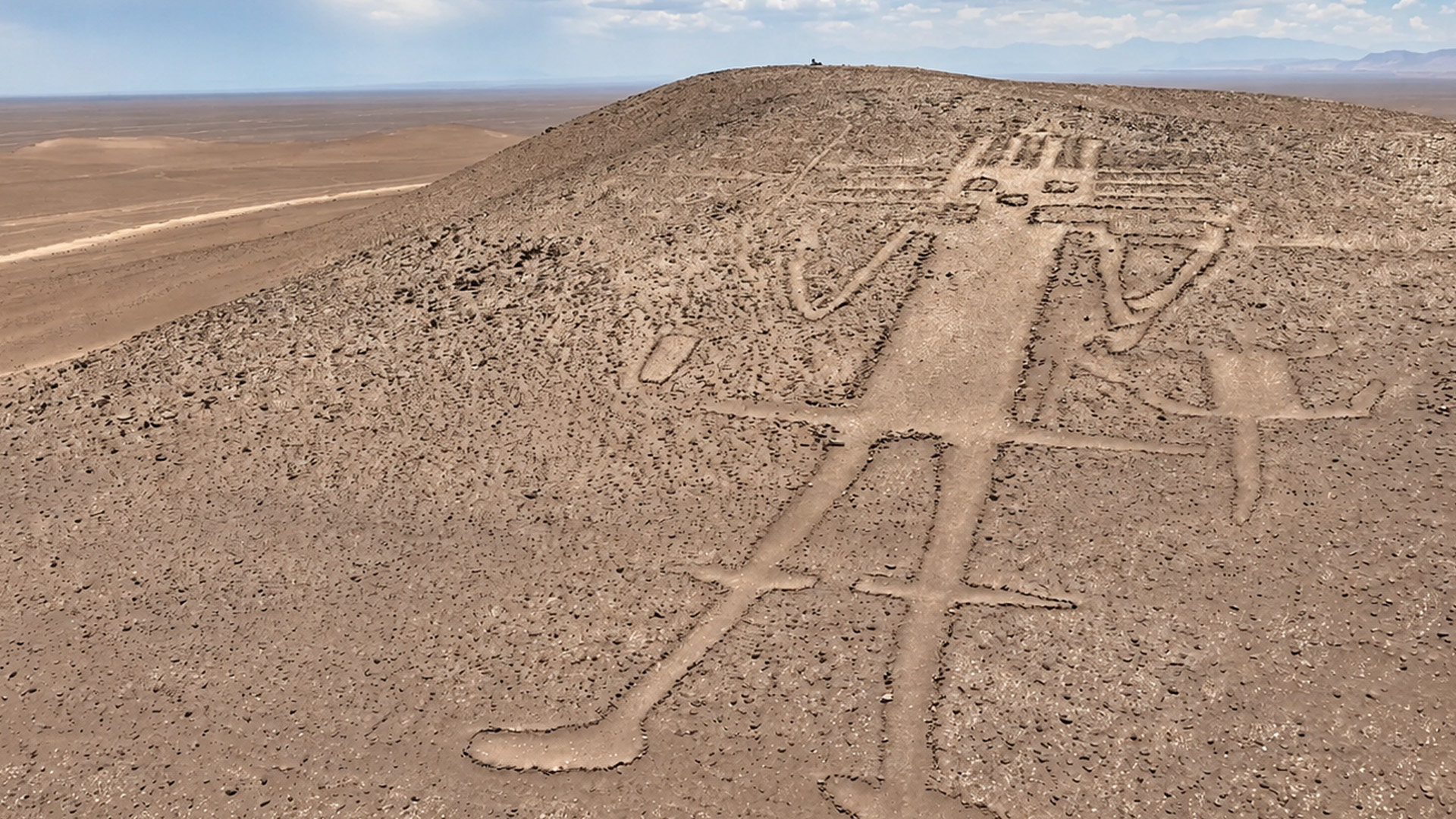 Who made this giant figure in the desert?