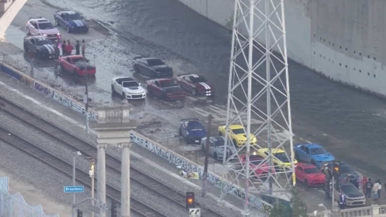 Nearly 90 arrested after dozens of sports cars towed from LA River in ...