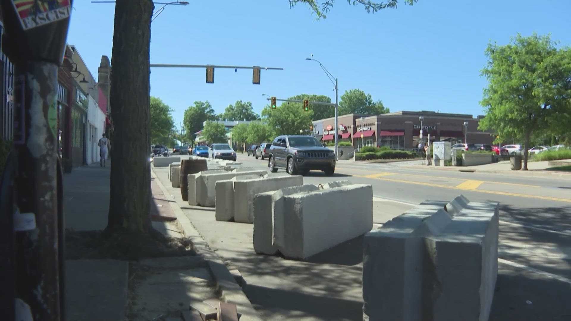 'It was nerve-wracking': 2 bystanders injured after exchange of gunfire ...