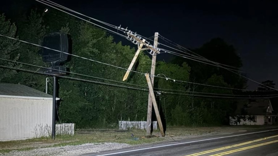 Power restored after powerlines spark fire