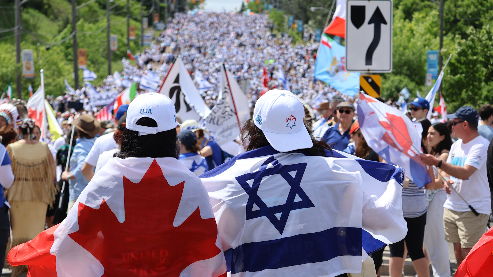 Tens of thousands of Jewish community members walk alongside allies in ...