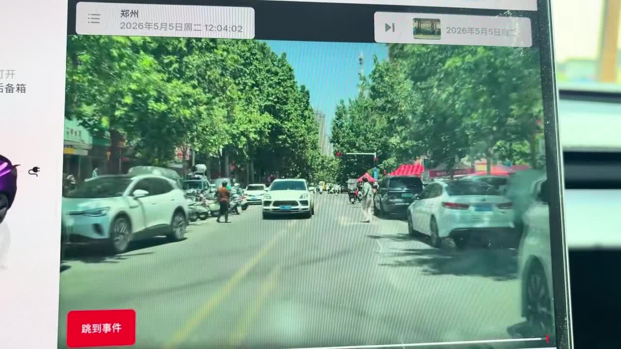Woman carrying toddler bumps into scooter rider while crossing road in ...