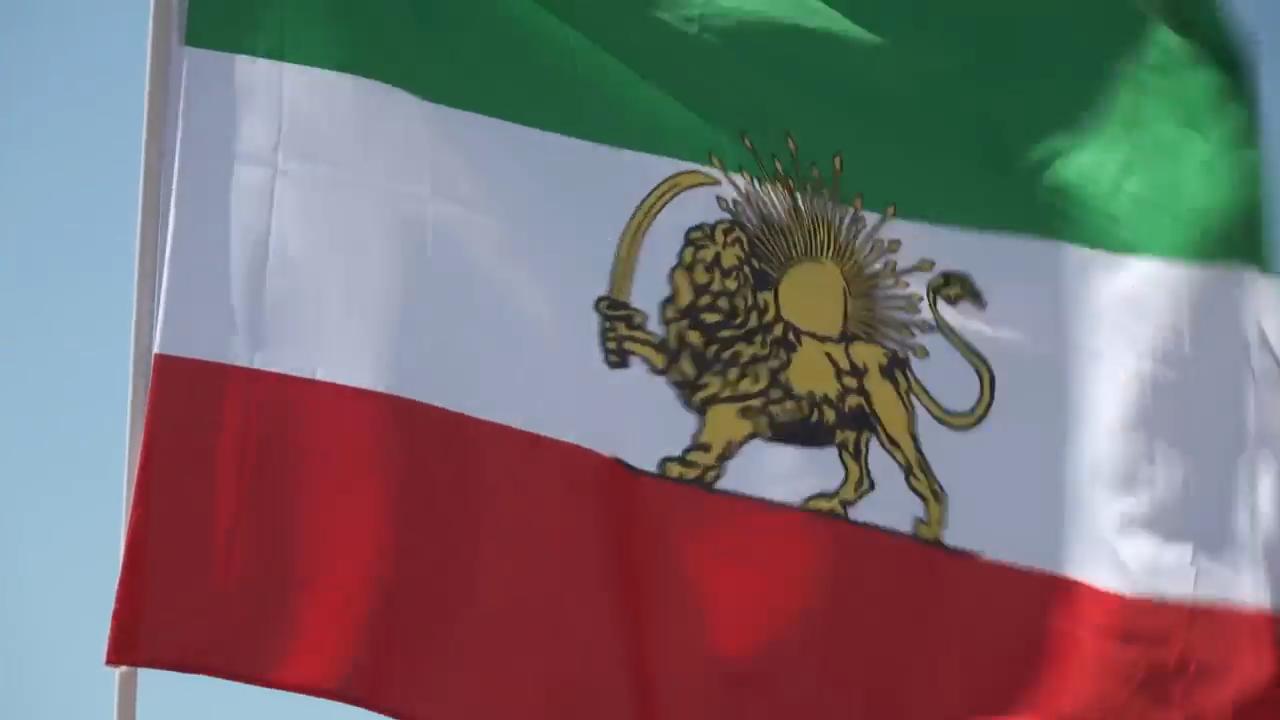 Demonstrators protest FIFA policy prohibiting pre-Islamic Revolution ...