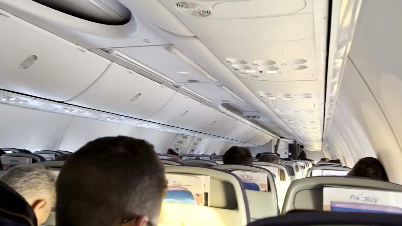 Passengers sitting inside plane on tarmac at Ben Gurion Airport receive ...