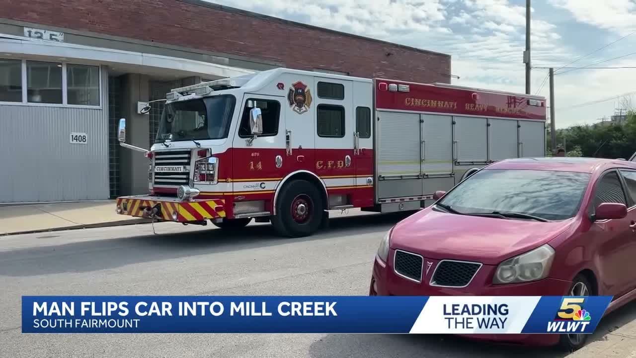 Driver rescued after car plunges into Mill Creek