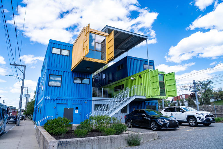 Why shipping containers are stacked off Route 6/10 and what they are