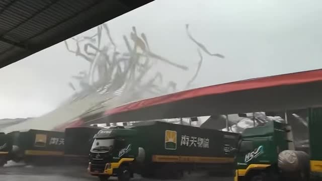 Warehouse roof torn off during tornado hits power line in China