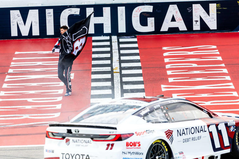 Why Denny Hamlin carried another driver’s flag after his Michigan ...